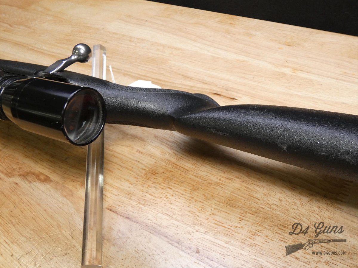 Knight D.I.S.C. - .50 Cal Black powder Rifle - 2x7 Burris Scope - Black ...